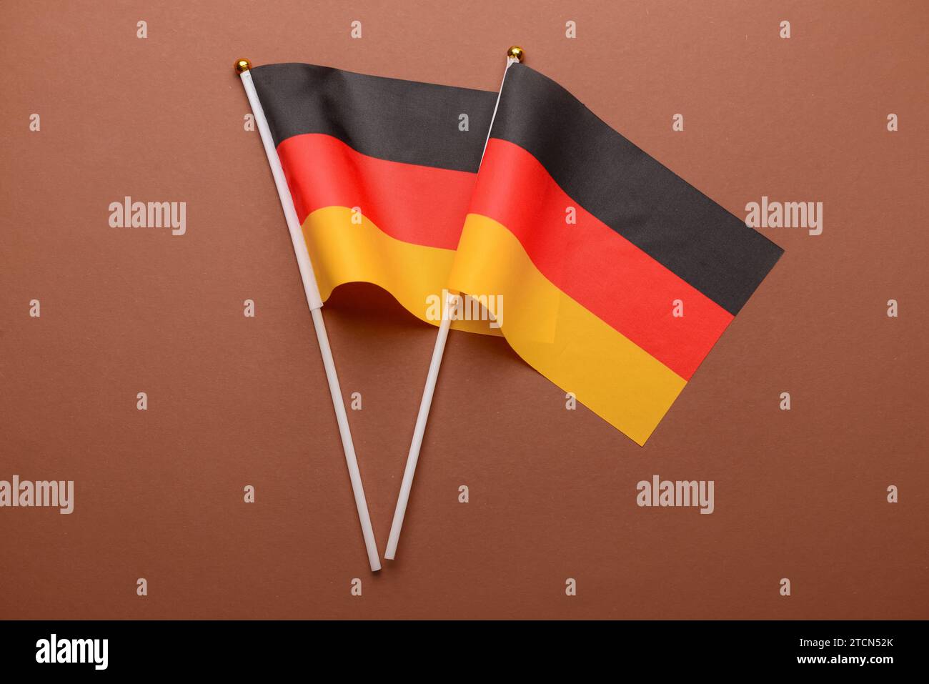 Flags of Germany on brown background Stock Photo - Alamy