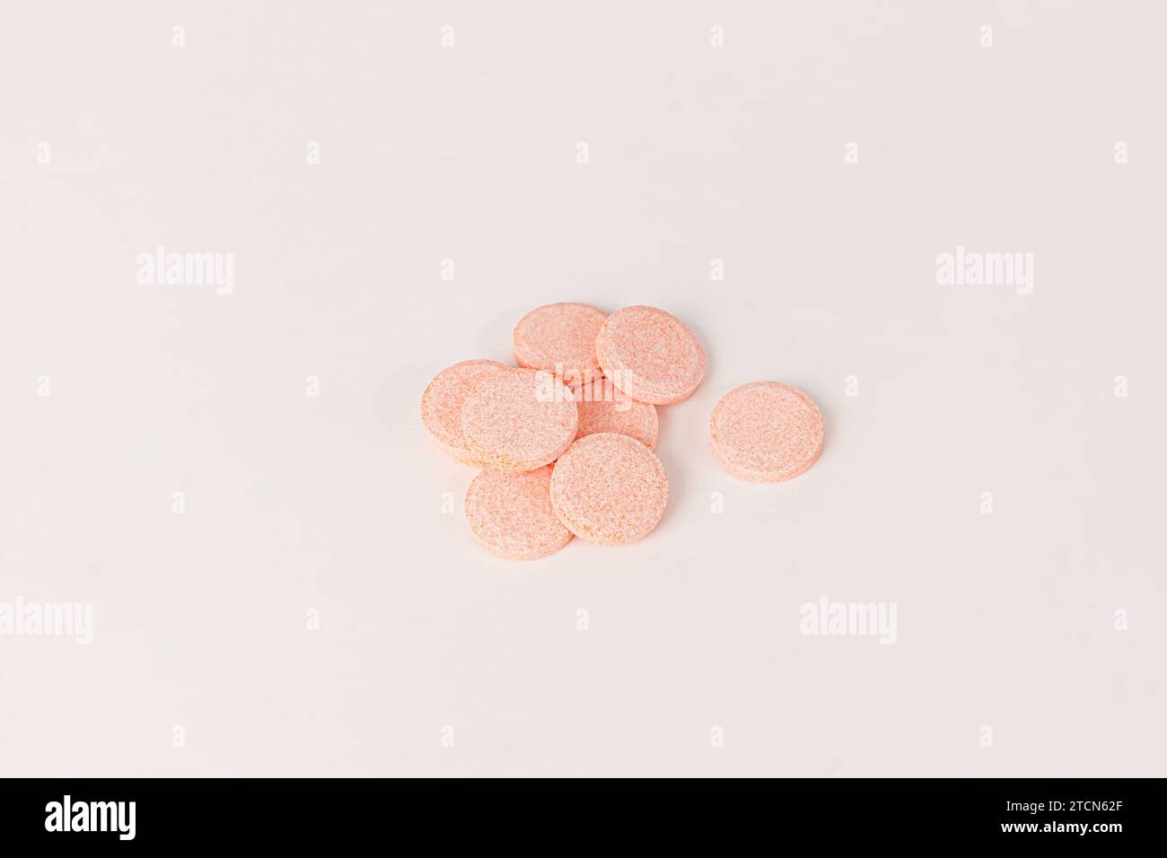 Yellow vitamin c tablet supplements isolated on a white background ...
