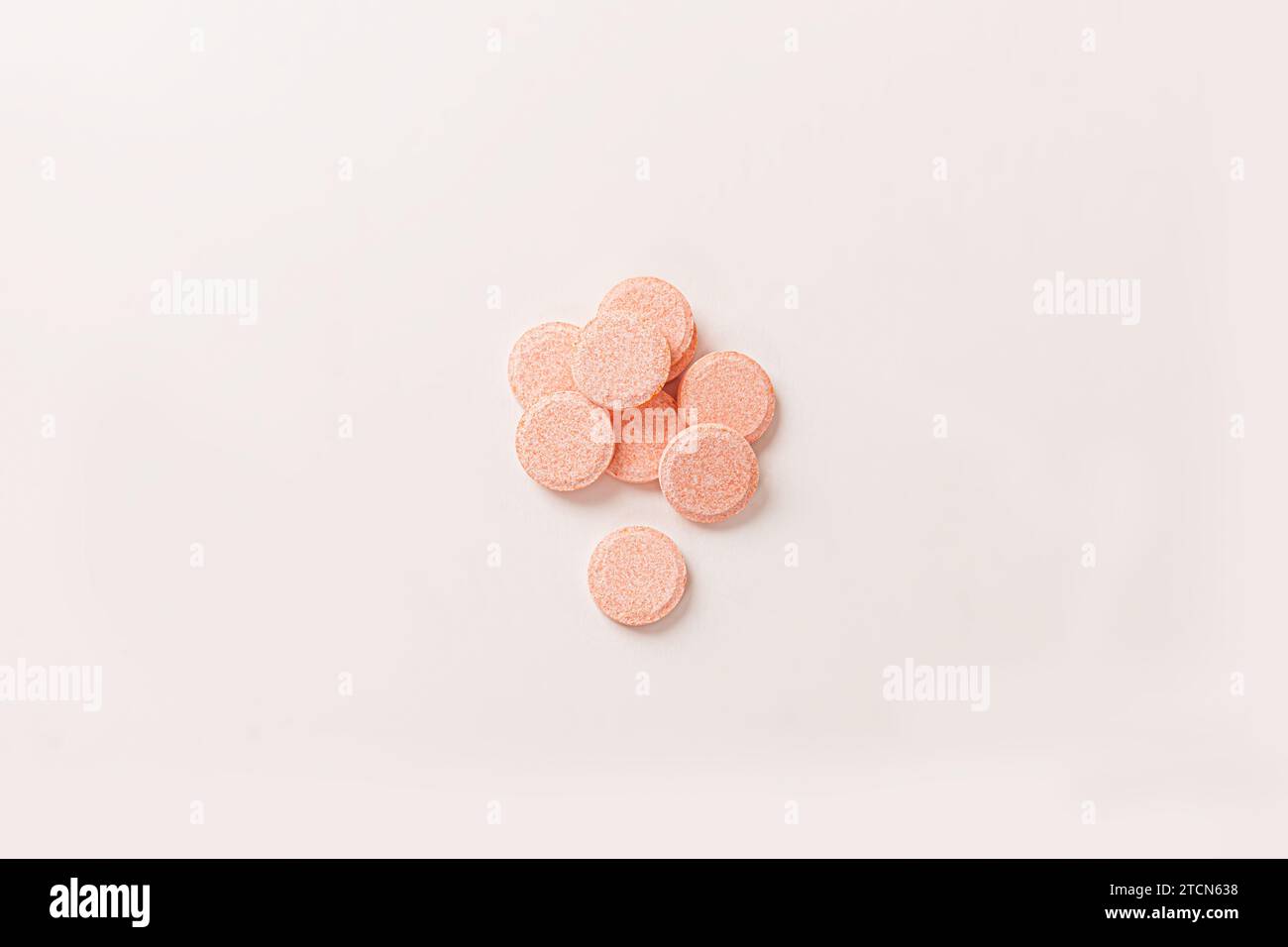 Yellow vitamin c tablet supplements isolated on a white background ...
