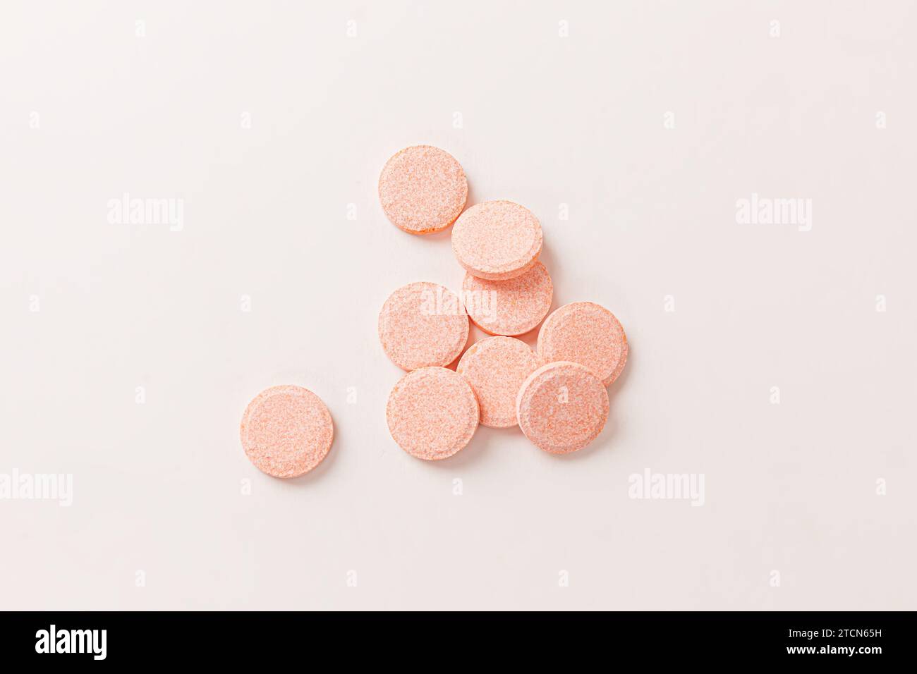 Yellow vitamin c tablet supplements isolated on a white background ...