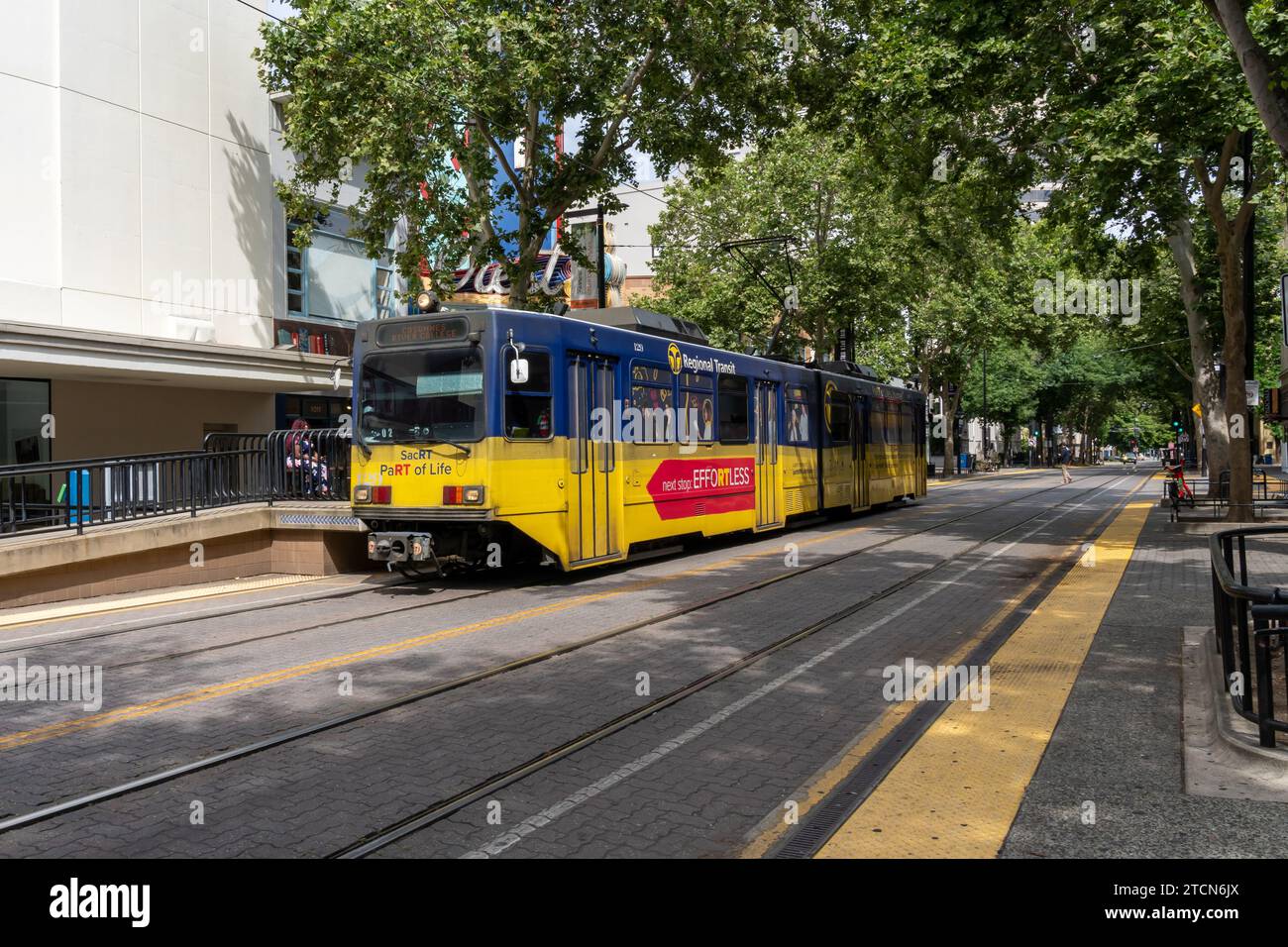 A Sacramento RT Light Rail vehicle on the street in downtown Sacramento ...