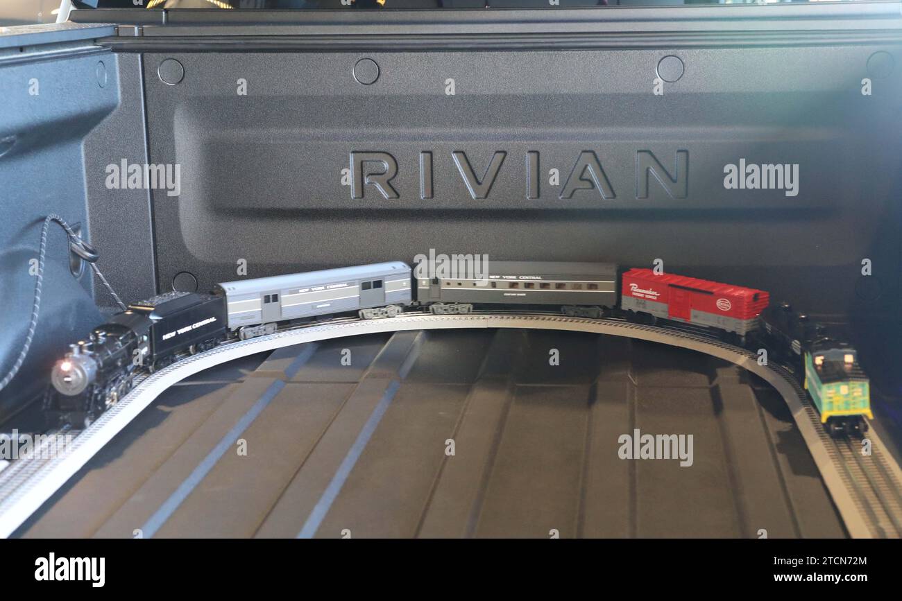 New York, New York, USA. 13th Dec, 2023. An electric train set powered ...