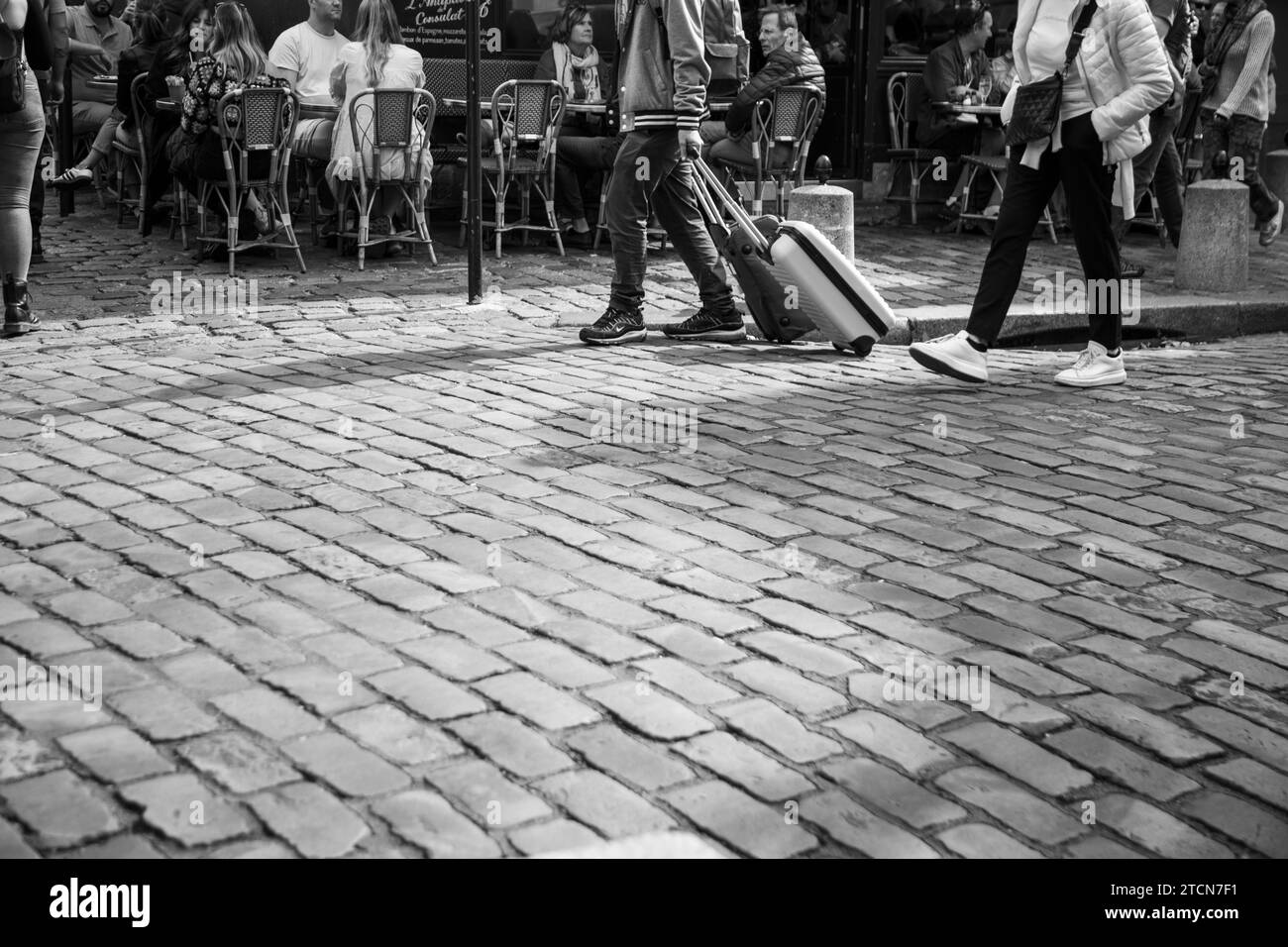 People walking the cobblestone streets of Monmartre, Paris, France ...