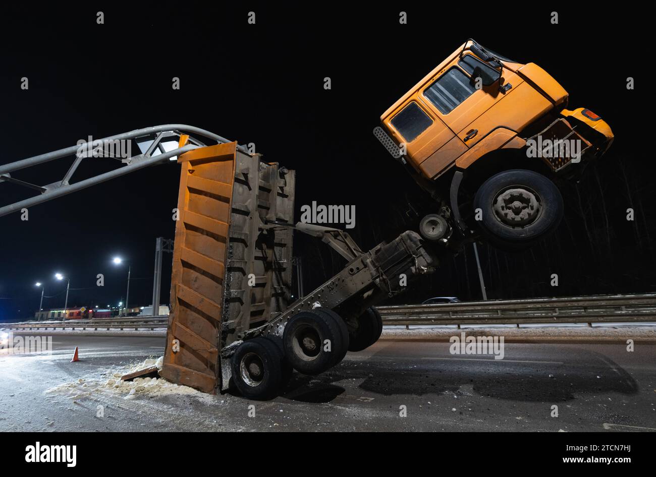 An accident on the road, a large truck caught a metal support with its ...