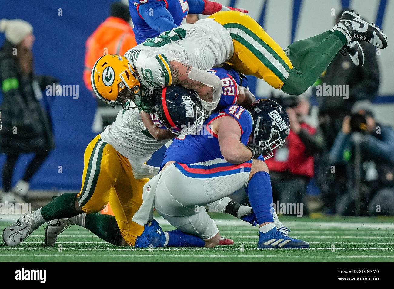 New York Giants safety Xavier McKinney (29) is tackled by Green Bay ...