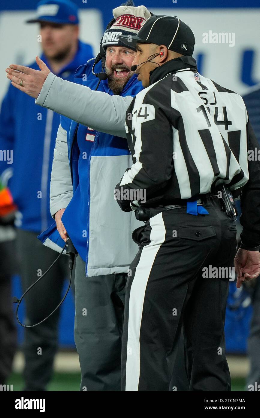 New York Giants head coach Brian Daboll speaks to side judge Dominique ...