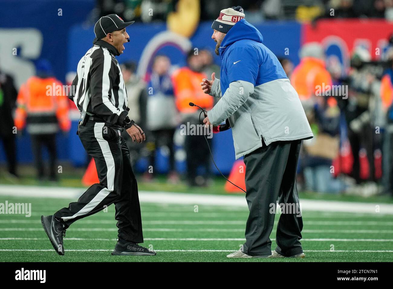 New York Giants head coach Brian Daboll speaks to side judge Dominique ...