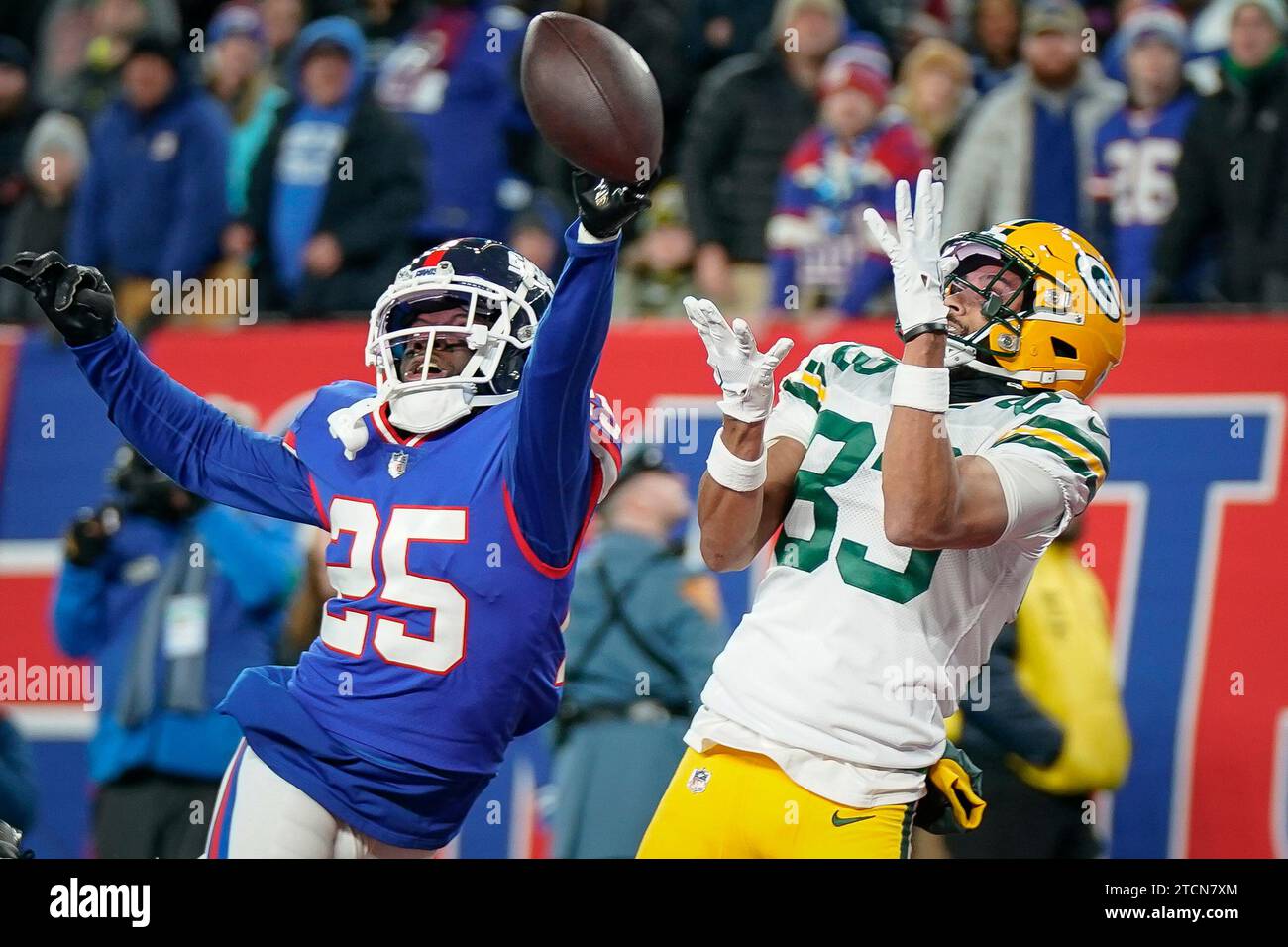 New York Giants cornerback Deonte Banks (25) breaks up a pass to Green Bay Packers wide receiver ...
