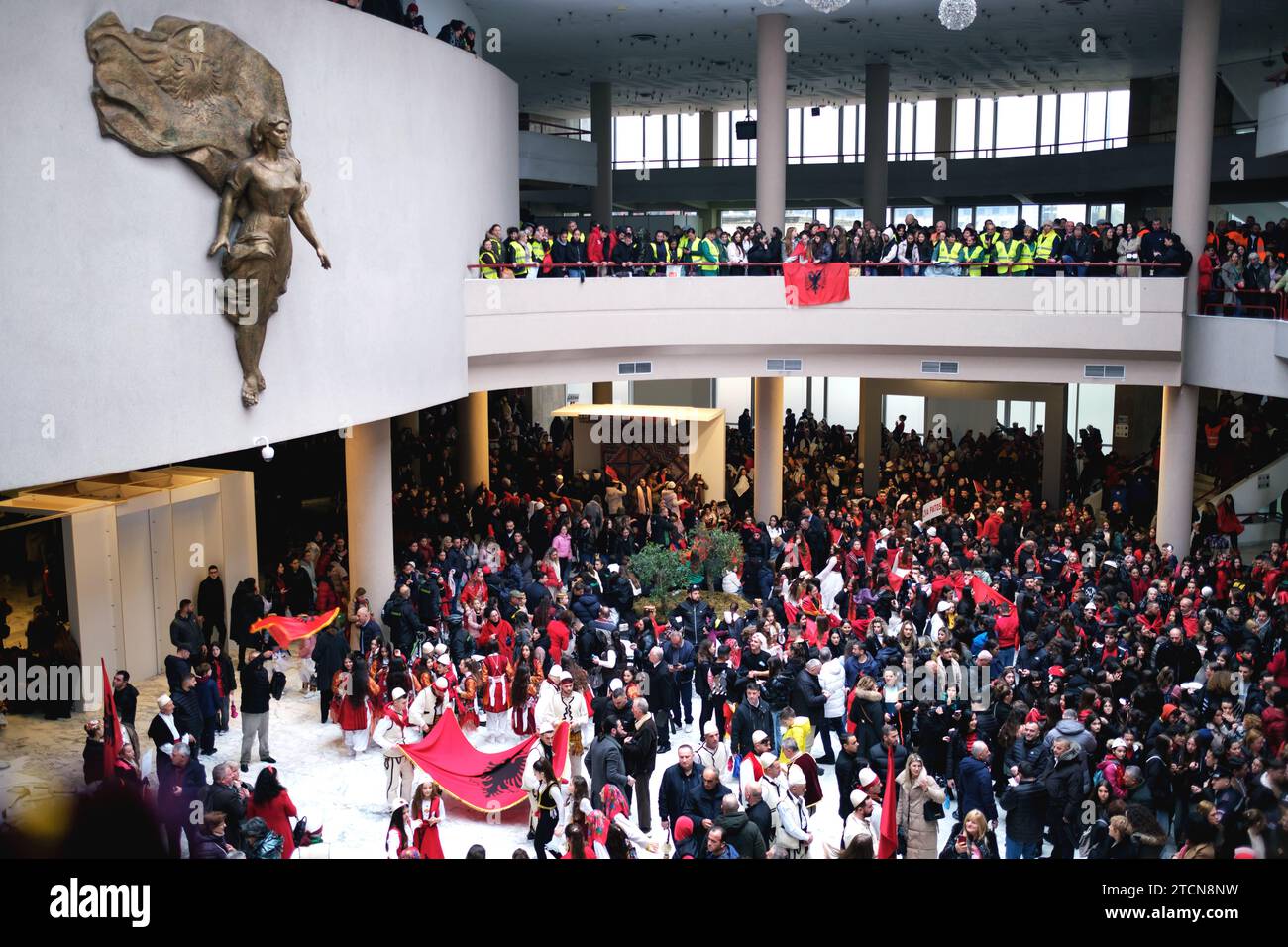 Tirana, Albania - November 28: An Albanian flag hangs on the balcony ...