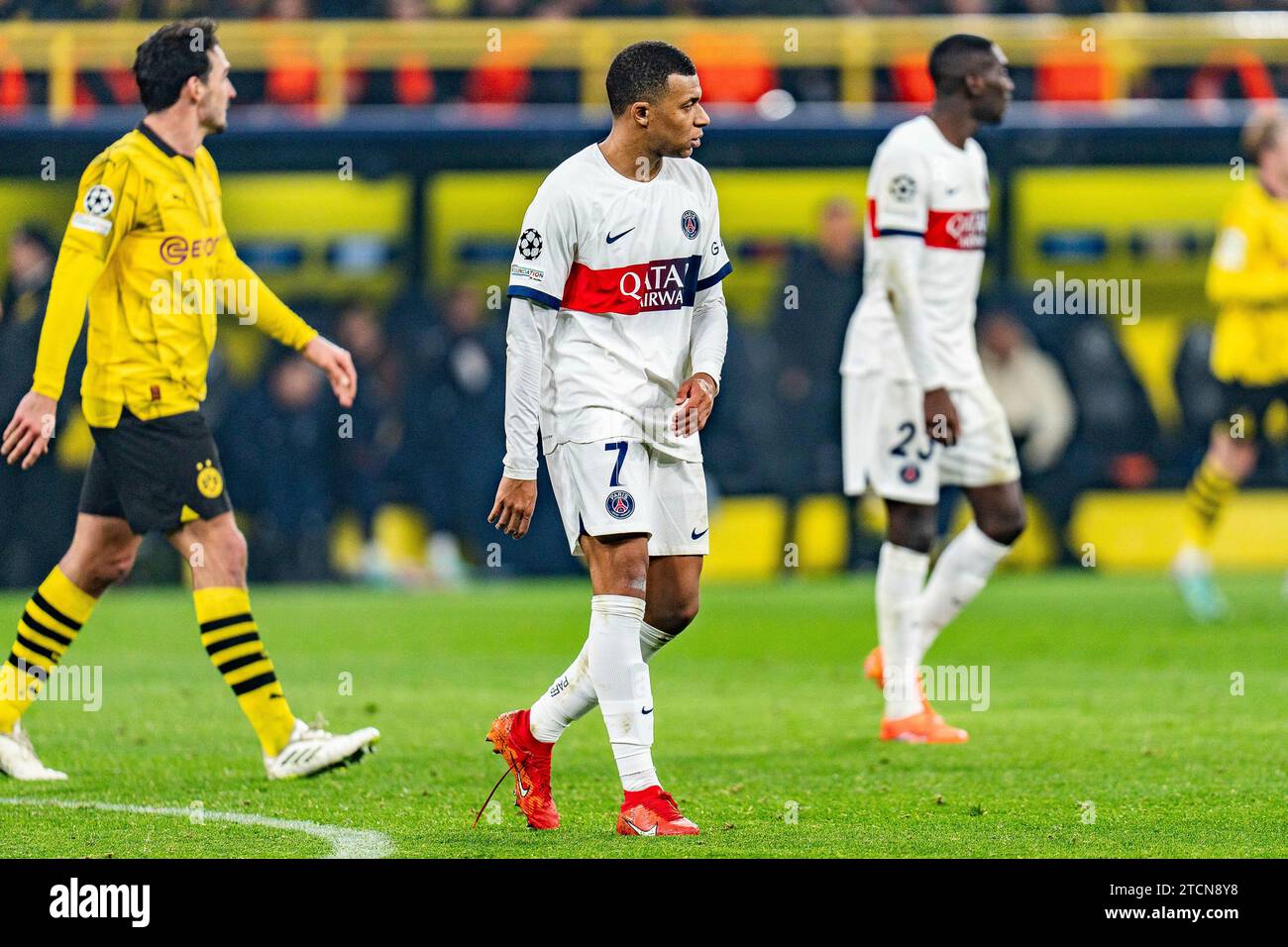 Dortmund, Deutschland. 13th Dec, 2023. Kylian Mbappe (Paris Saint-Germain, #7) Mats Hummels ...