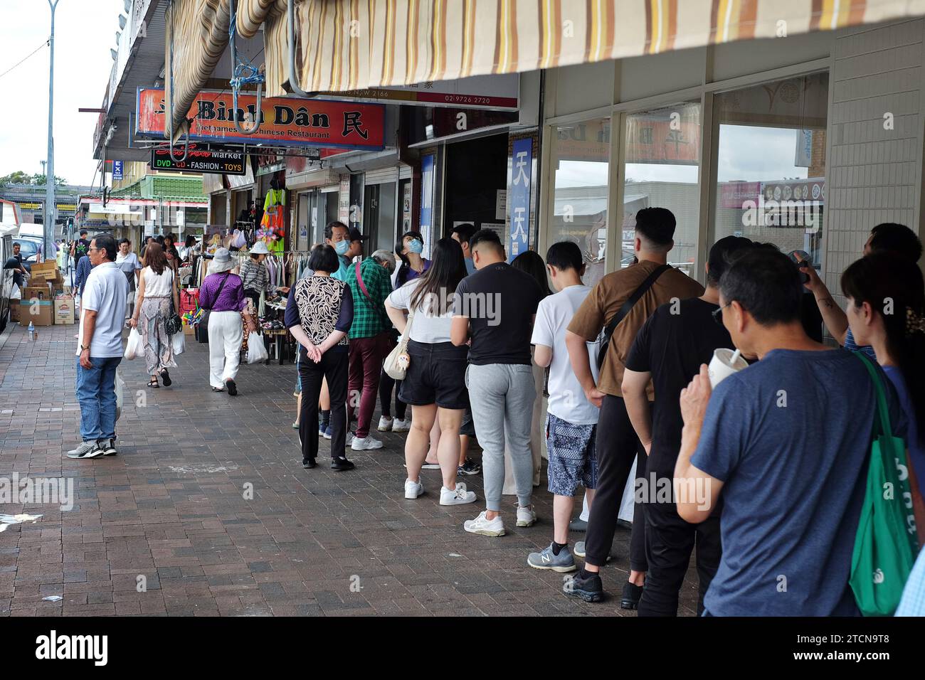 People in a restaurant queue for Yum Cha outside a popular Vietnamese ...