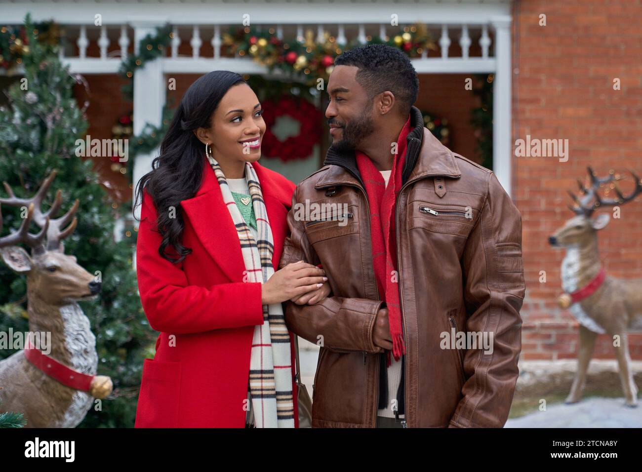 CHRISTMAS WITH A KISS, from left: Mishael Morgan, Jaime M. Callica ...