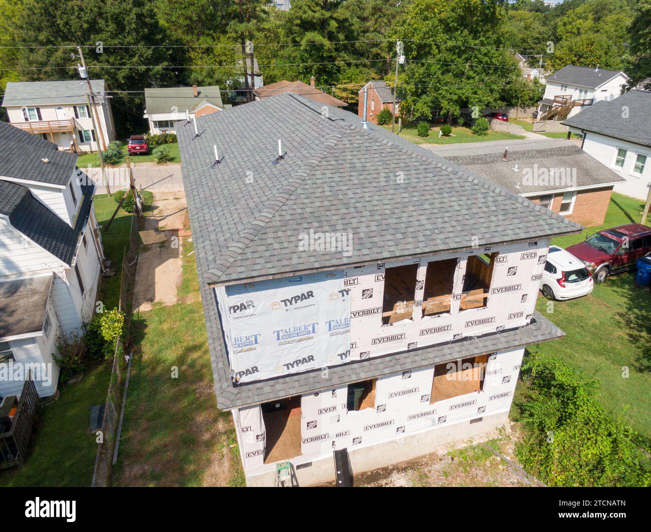 drone images of a residential roof installation on a new construction ...