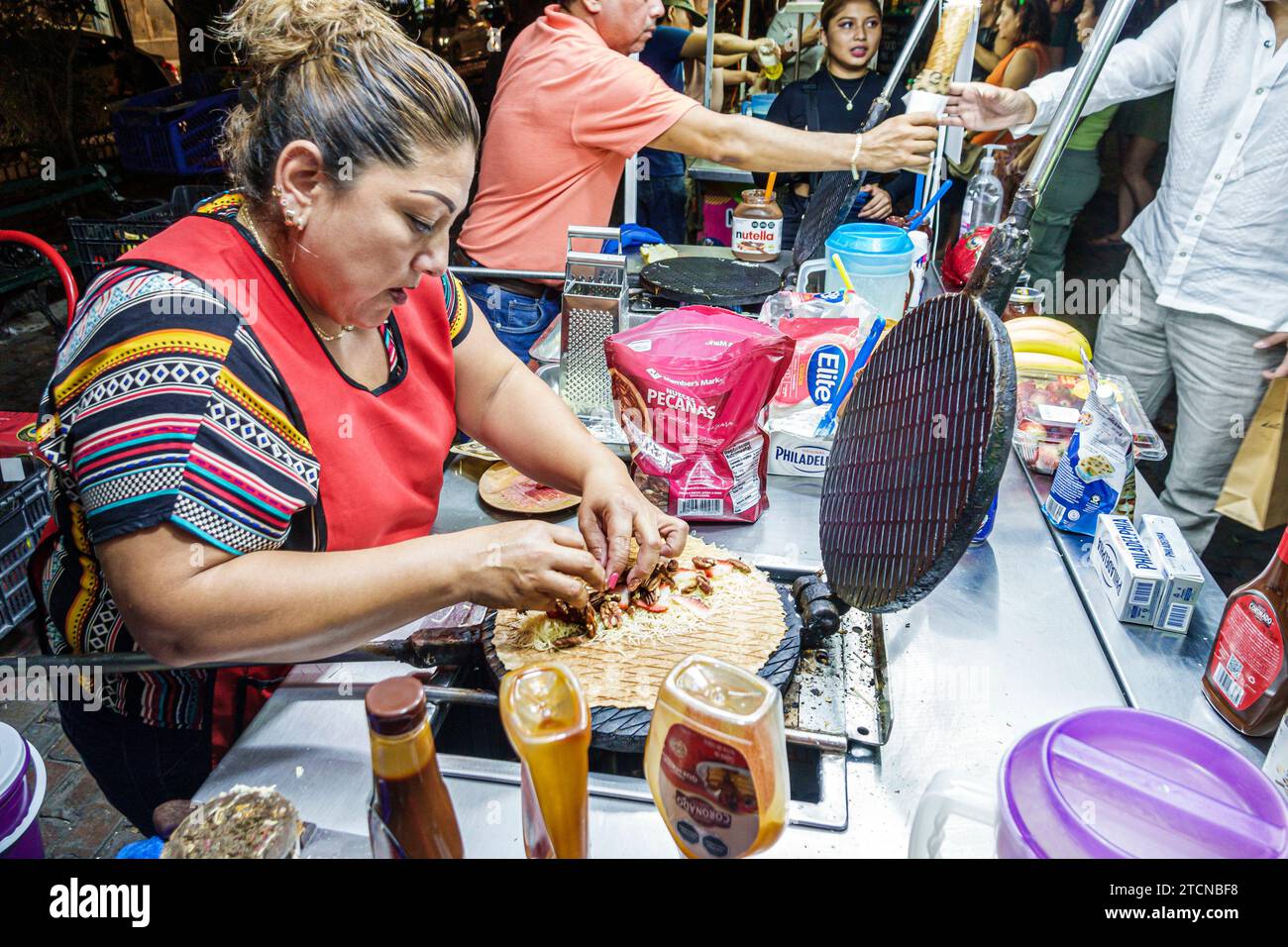 Merida Mexico,centro historico central historic district,making cooking ...