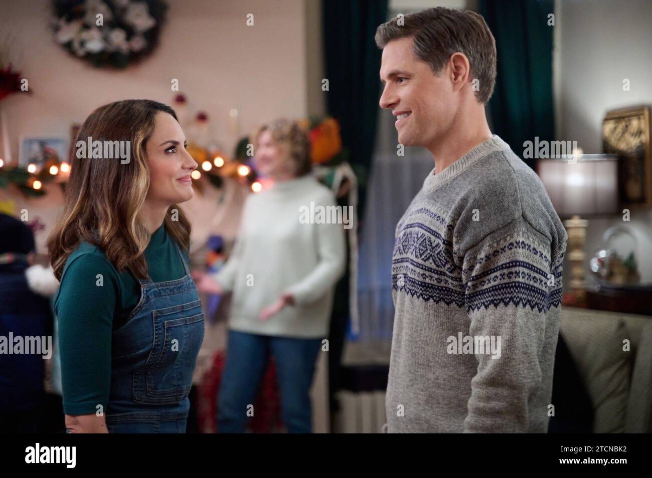 RESCUING CHRISTMAS, from left: Rachael Leigh Cook, Sam Page, (aired Dec ...