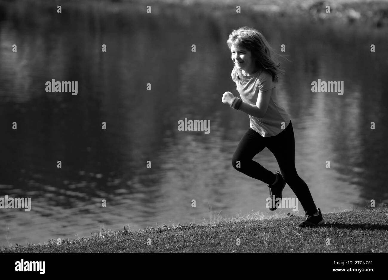 Child boy jogging in park outdoor. Sporty kid running in nature Stock ...