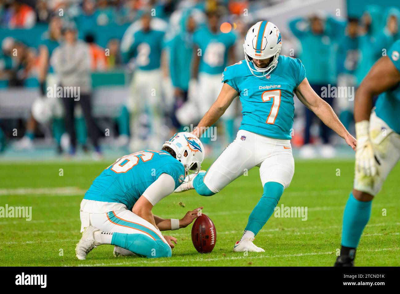 Miami Dolphins punter Jake Bailey (16) holds the ball as Miami Dolphins kicker Jason Sanders (7 ...