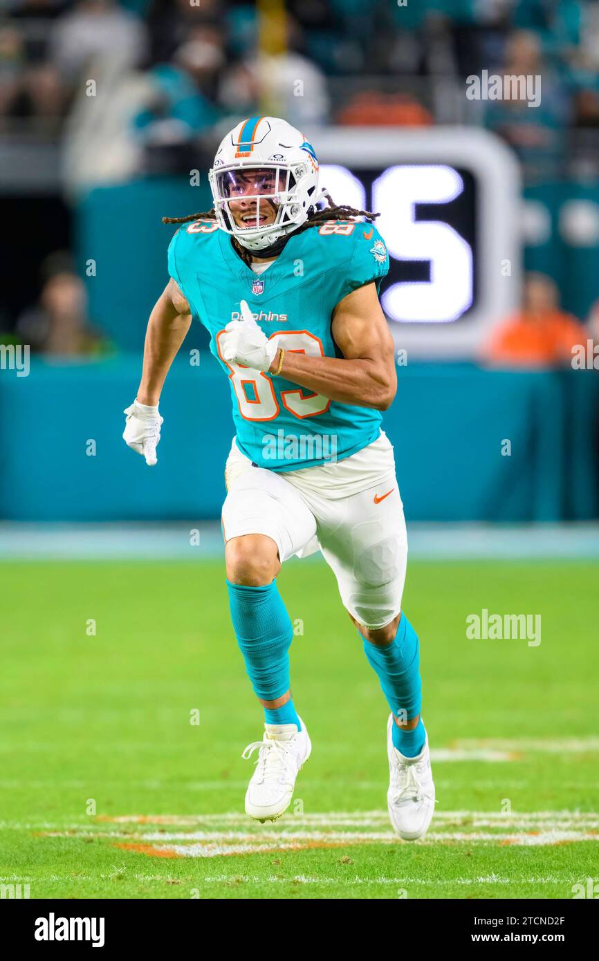 Miami Dolphins wide receiver Chase Claypool (83) runs a play during an ...