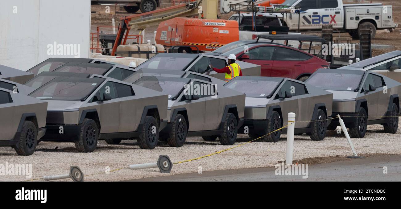 New Tesla Cybertrucks are parked outside the huge Tesla factory in ...