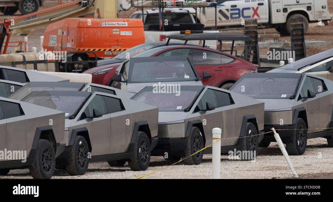 New Tesla Cybertrucks are parked outside the huge Tesla factory in ...