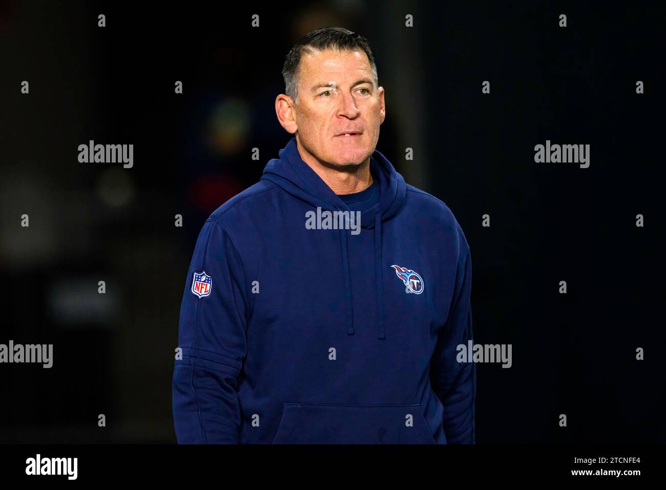 Tennessee Titans special team assistant Tom Quinn walks onto the field ...