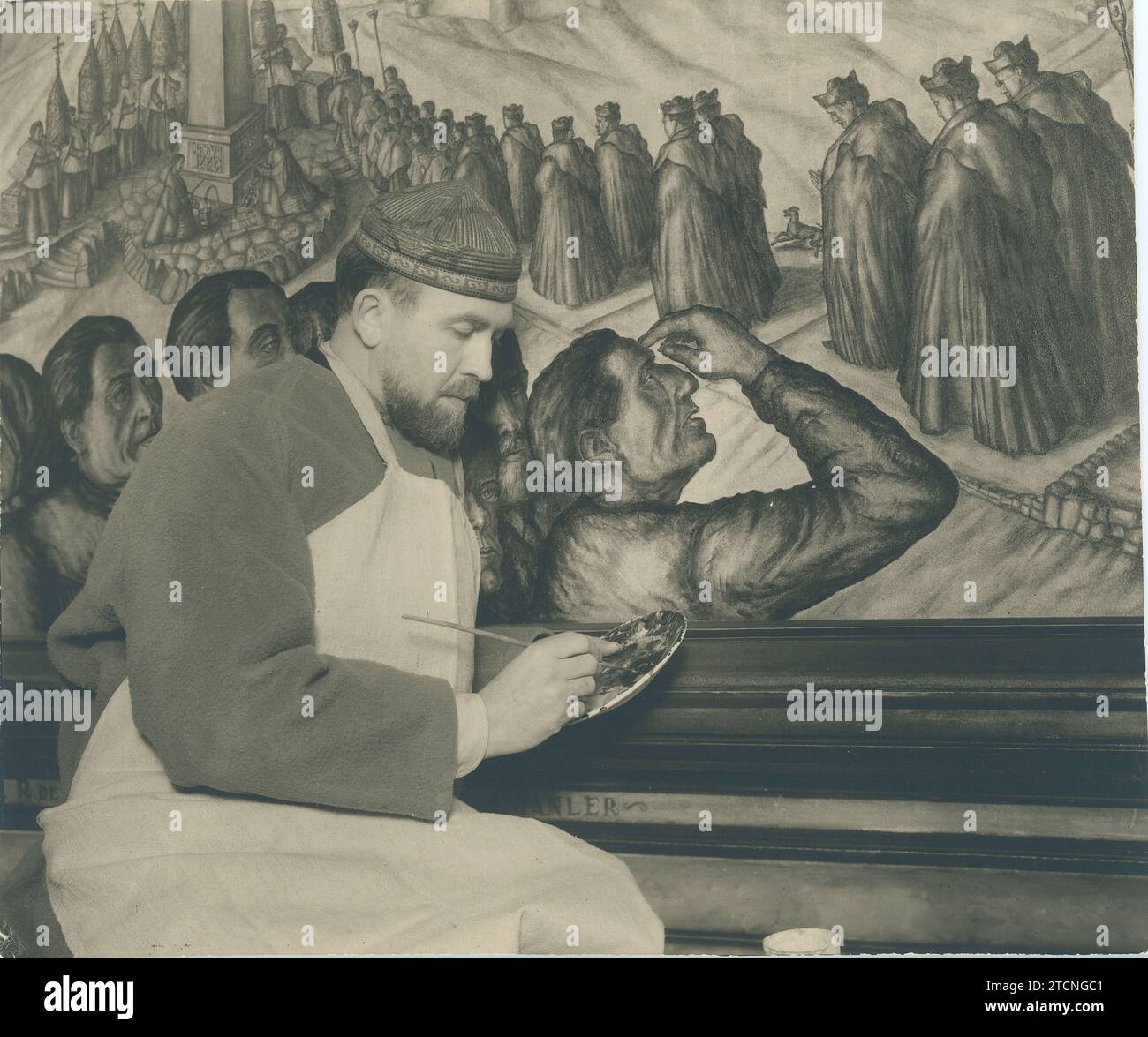 01/01/1930. Russian painter Serge Rovinsky putting the finishing ...