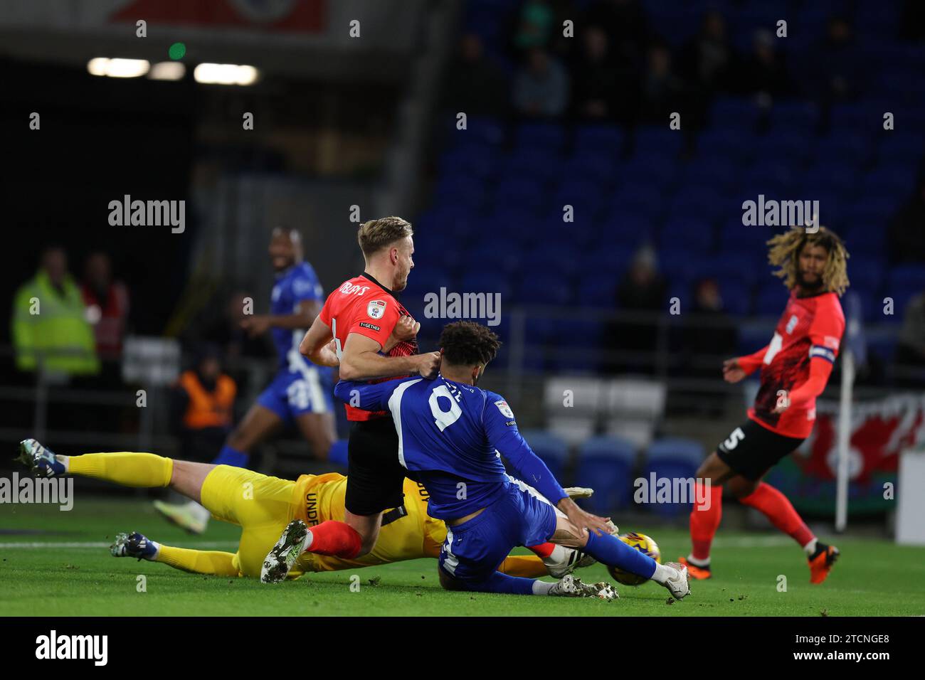 Cardiff, UK. 13th Dec, 2023. Marc Roberts of Birmingham city and John ...