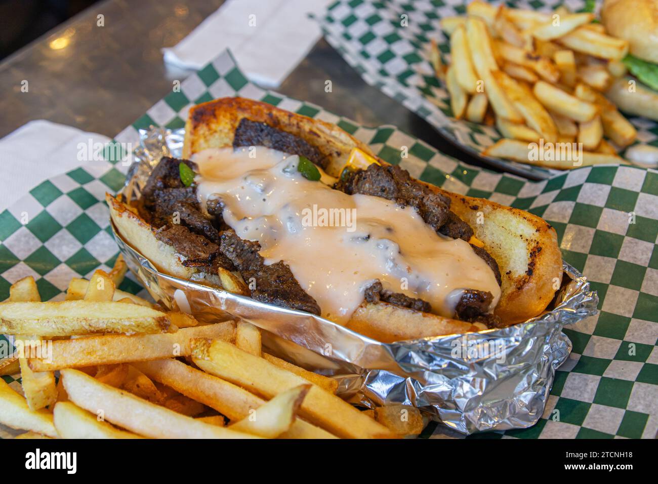 Closeup Philly cheesesteak sandwich (Philadelphia cheesesteak) and ...