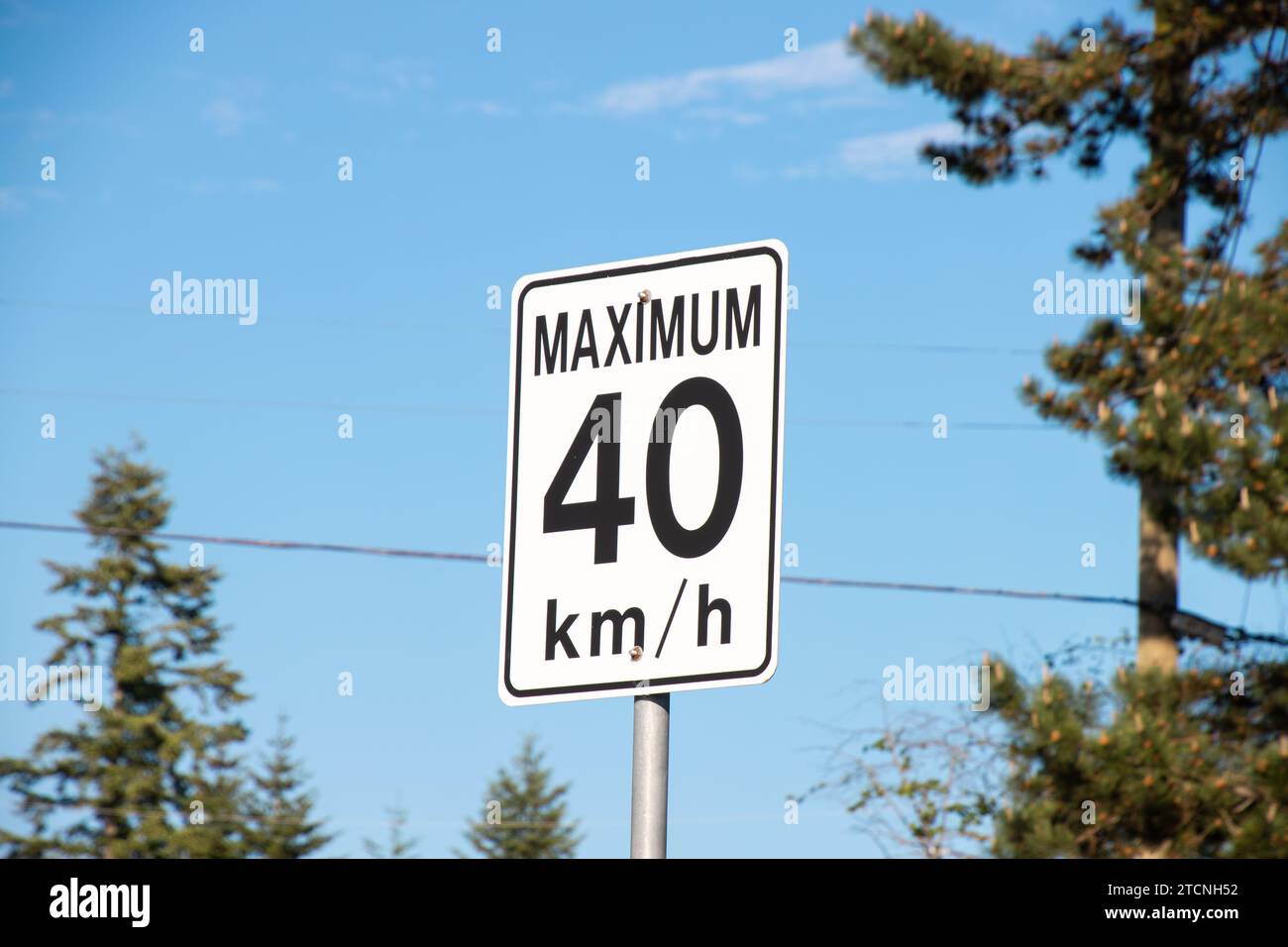 “Maximum 40km/h” road sign on the street, in the residencial area Stock ...