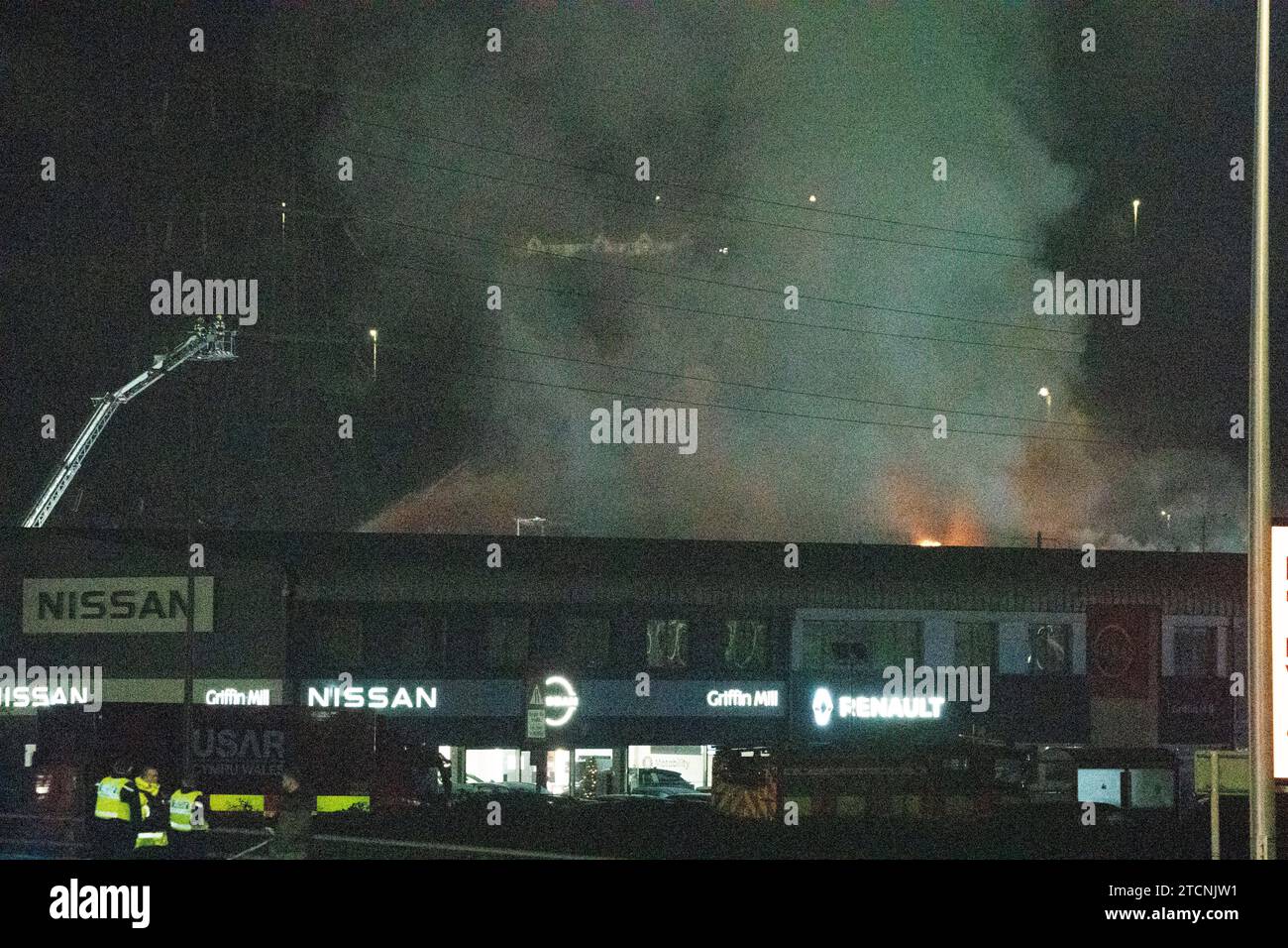 Firefighters douse water on flames at the scene on Severn Road ...