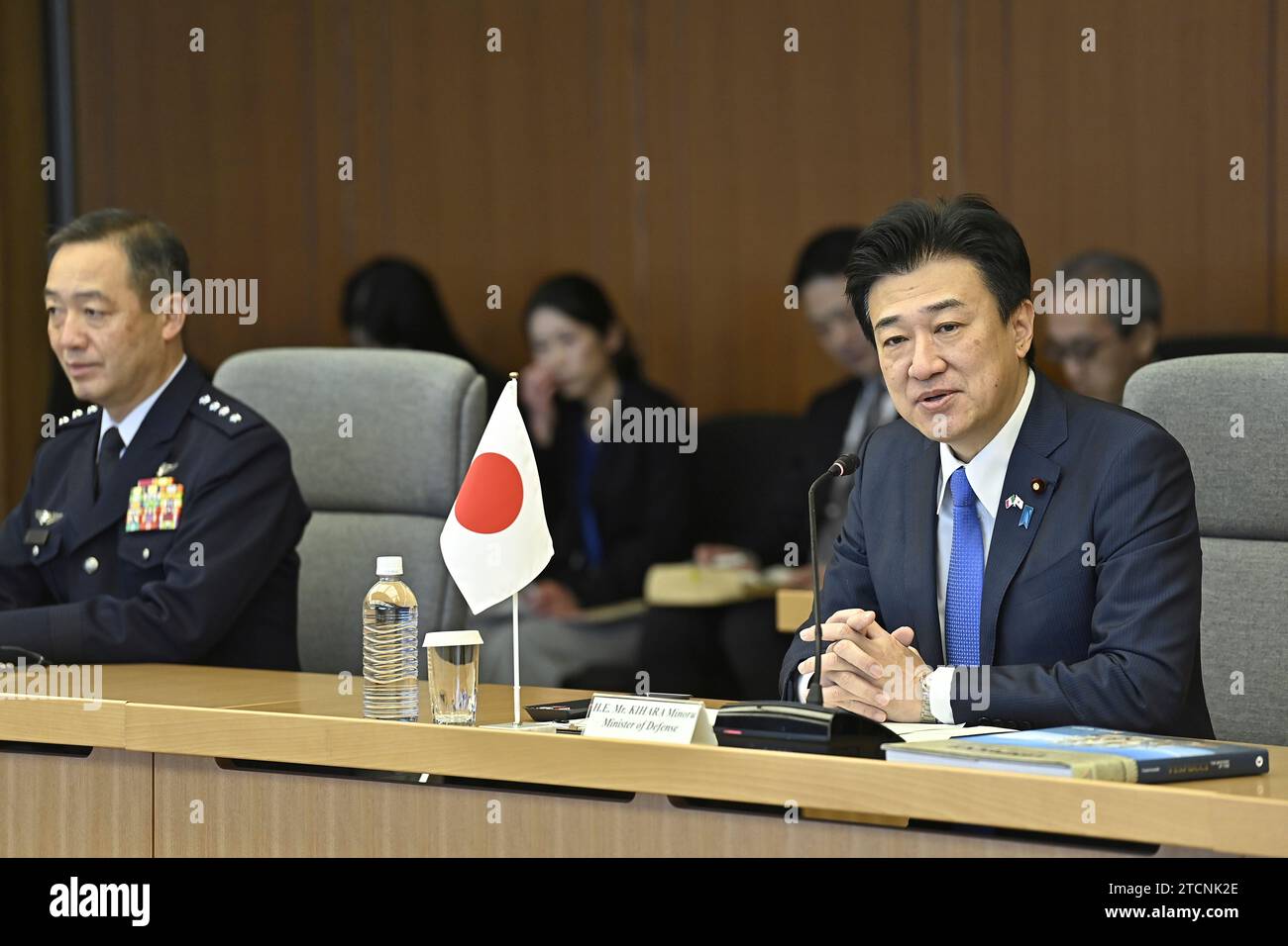 Japanese Defense Minister Minoru Kihara, right, talks during a ...