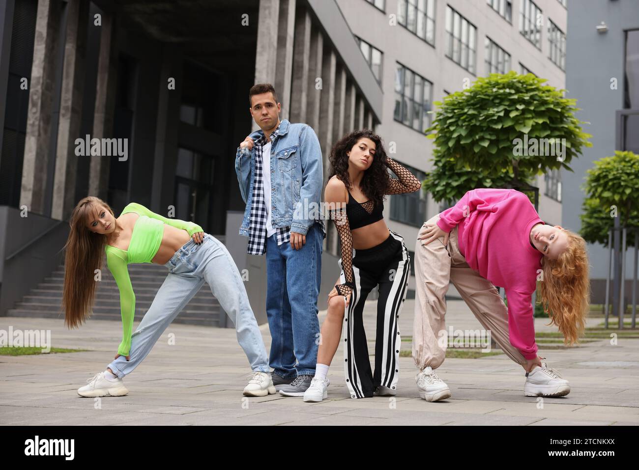 Group of people dancing hip hop outdoors Stock Photo - Alamy