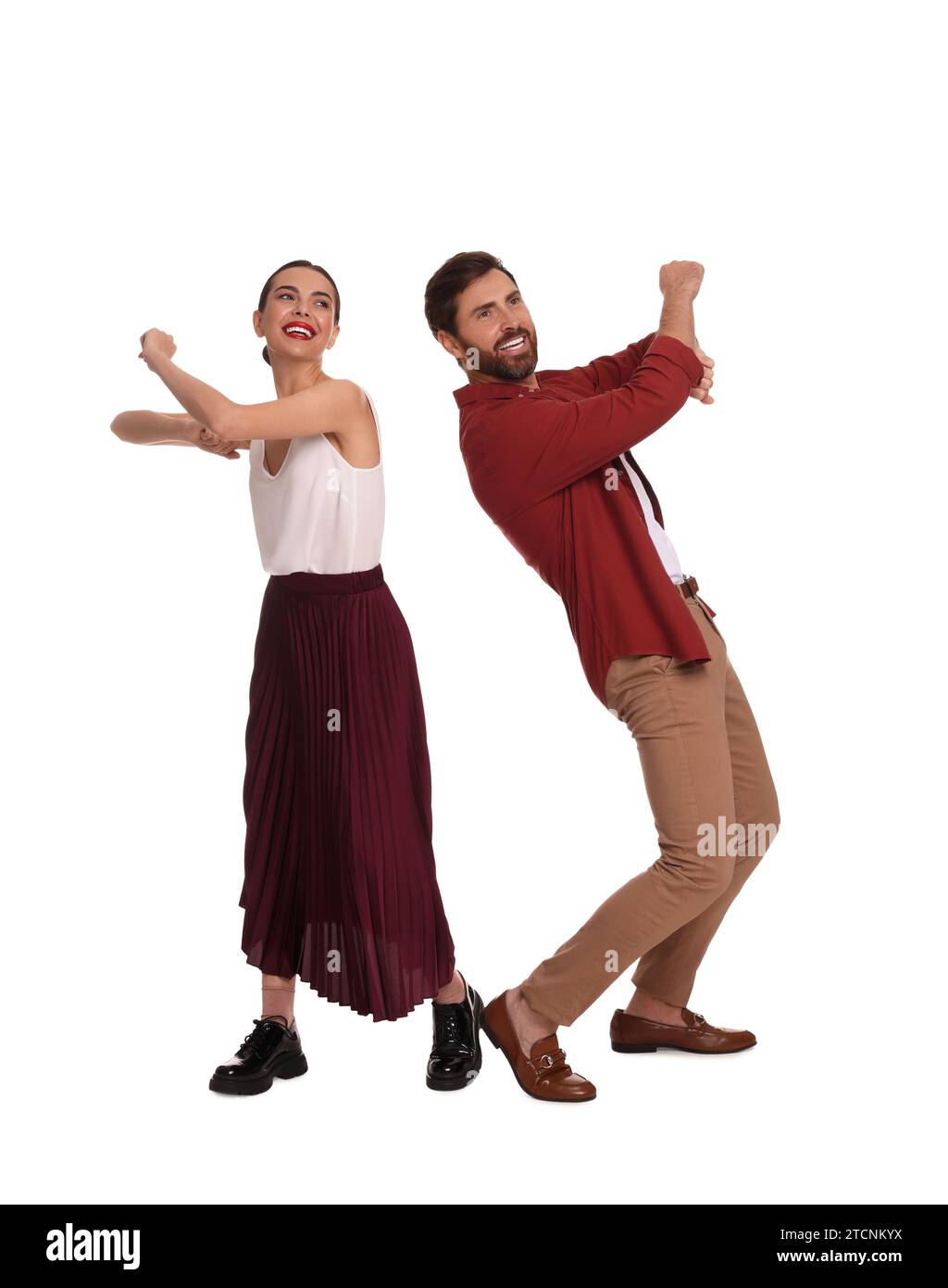 Happy couple dancing together on white background Stock Photo - Alamy