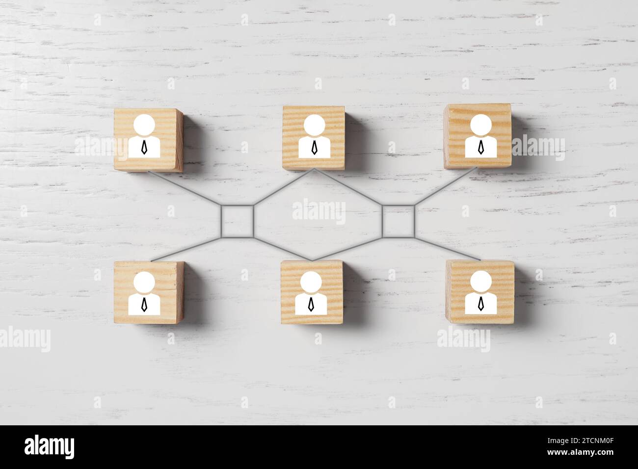 Teamwork. Cubes with human icons linked together symbolizing ...