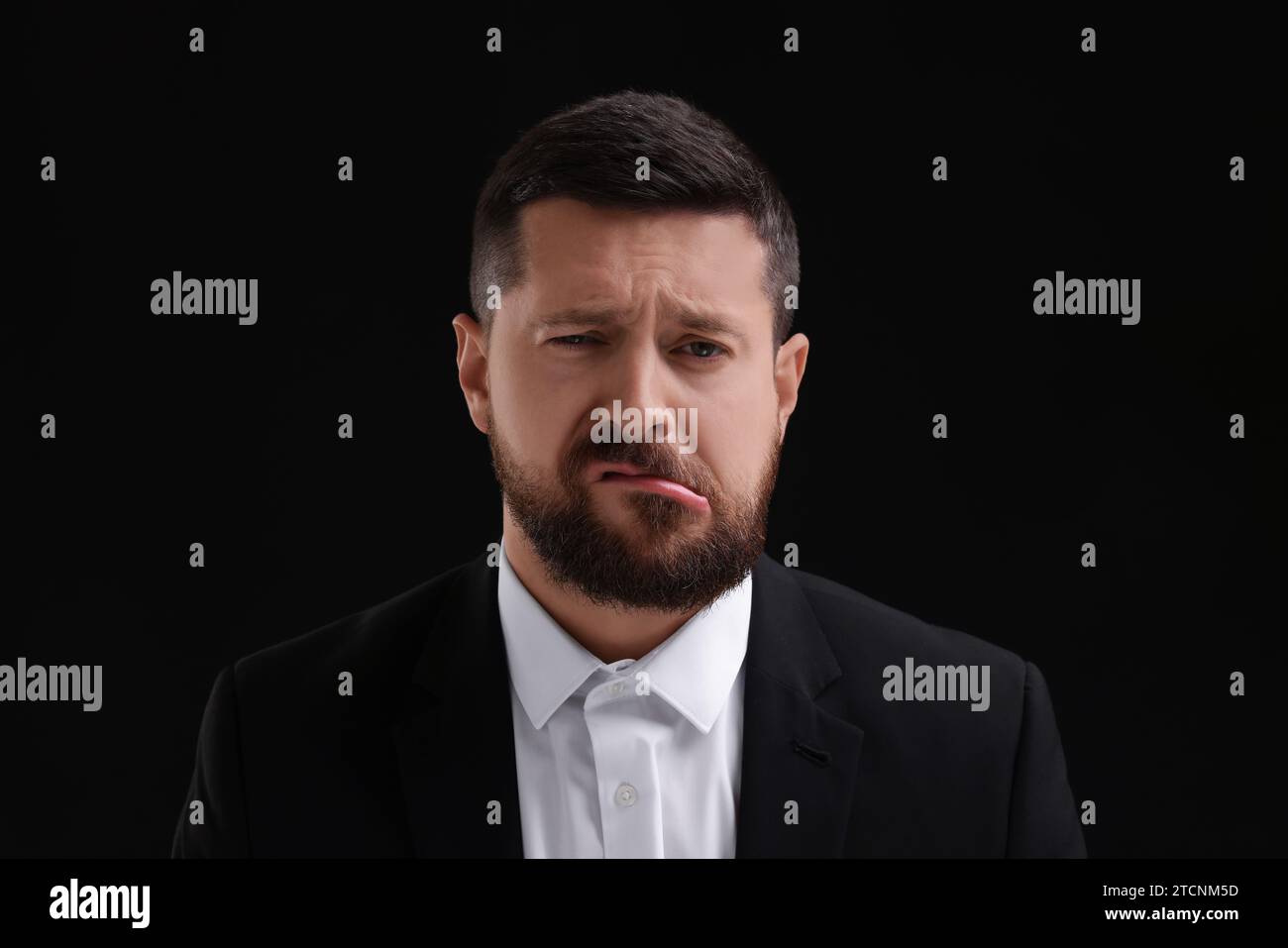 Personality concept. Emotional man on black background Stock Photo - Alamy