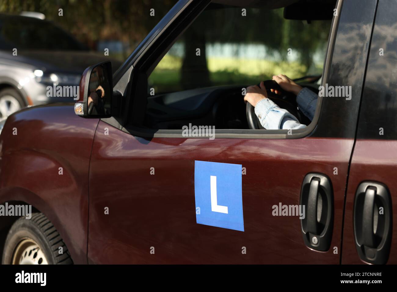 Driving car l plate hi-res stock photography and images - Alamy