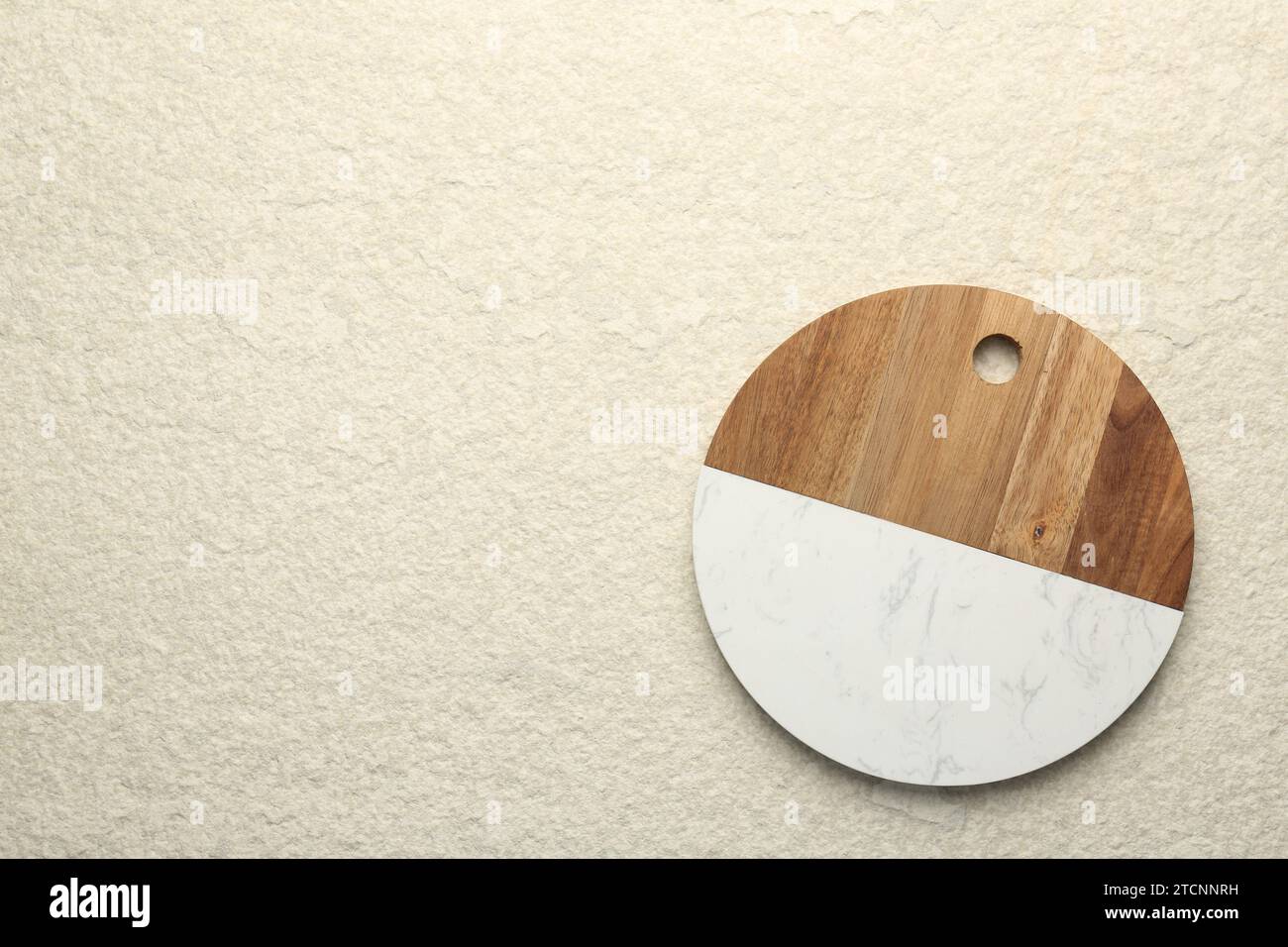 Serving board on beige table, top view. Space for text Stock Photo - Alamy