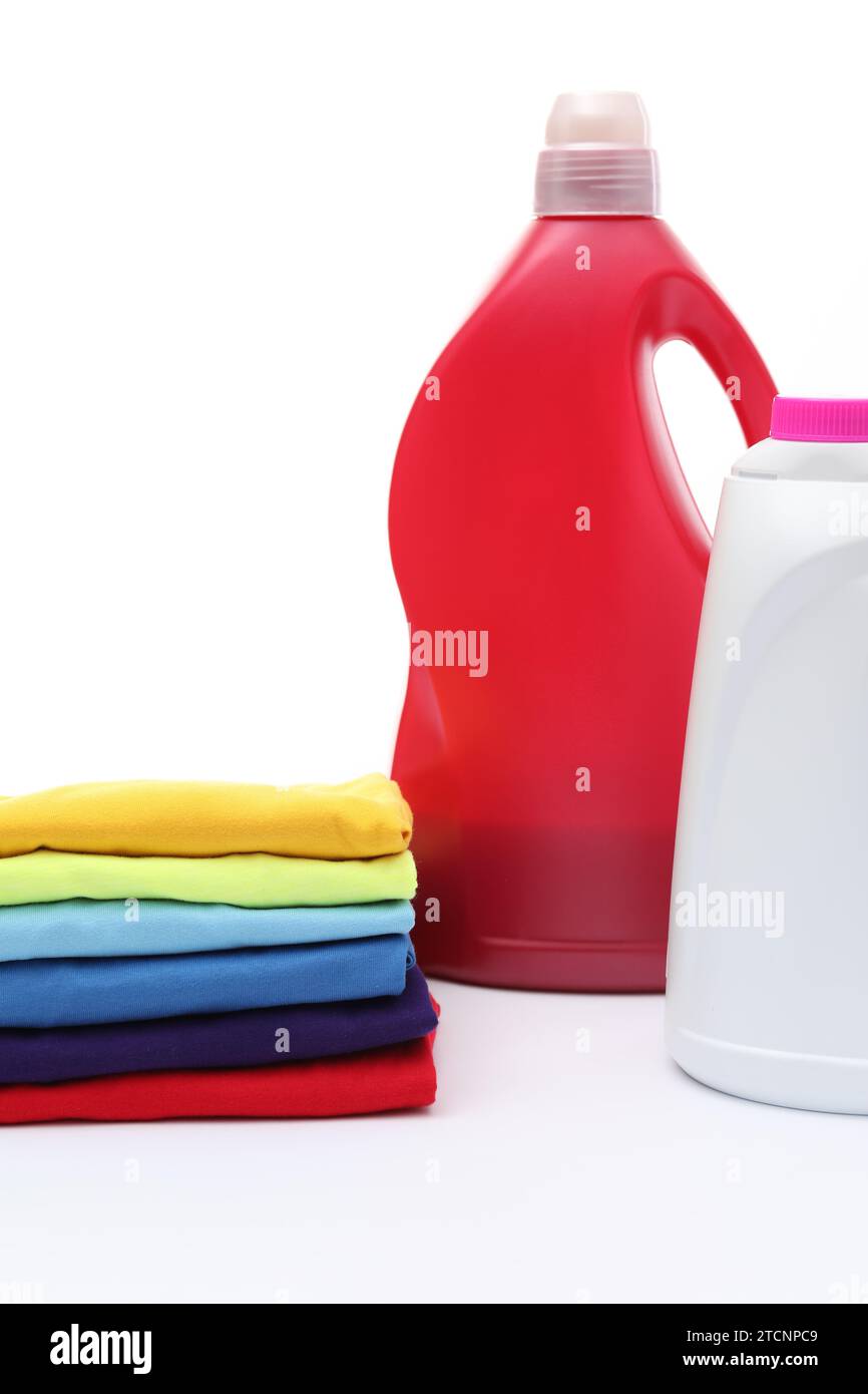 Stack of baby clothes and laundry detergents isolated on white Stock ...