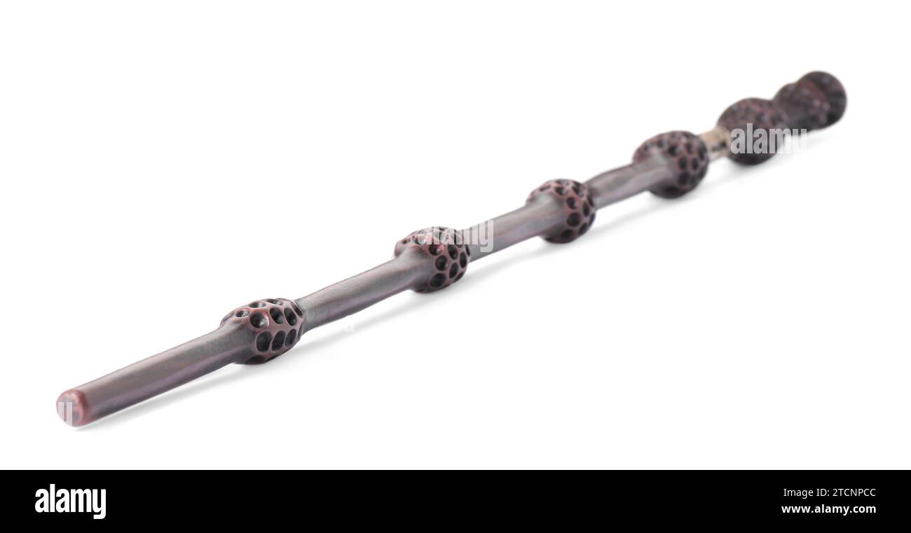 One old magic wand isolated on white Stock Photo - Alamy