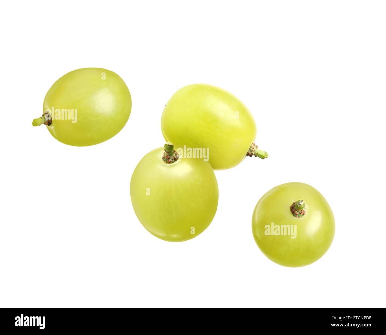 Delicious fresh grapes falling on white background Stock Photo - Alamy