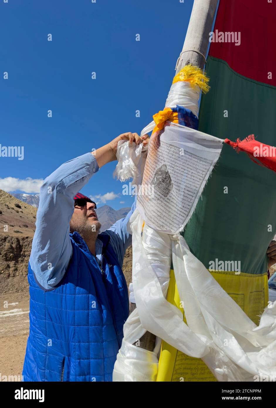 Bodhi Garrett hands a prayer flag on the pass from Yara to Tange ...