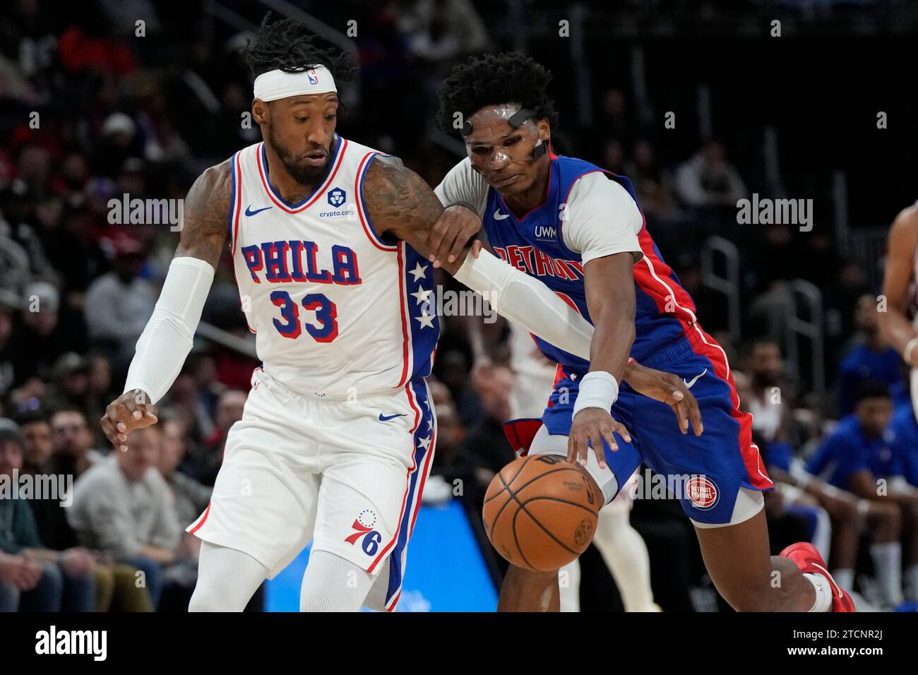 Detroit Pistons forward Ausar Thompson tries dribbling past ...