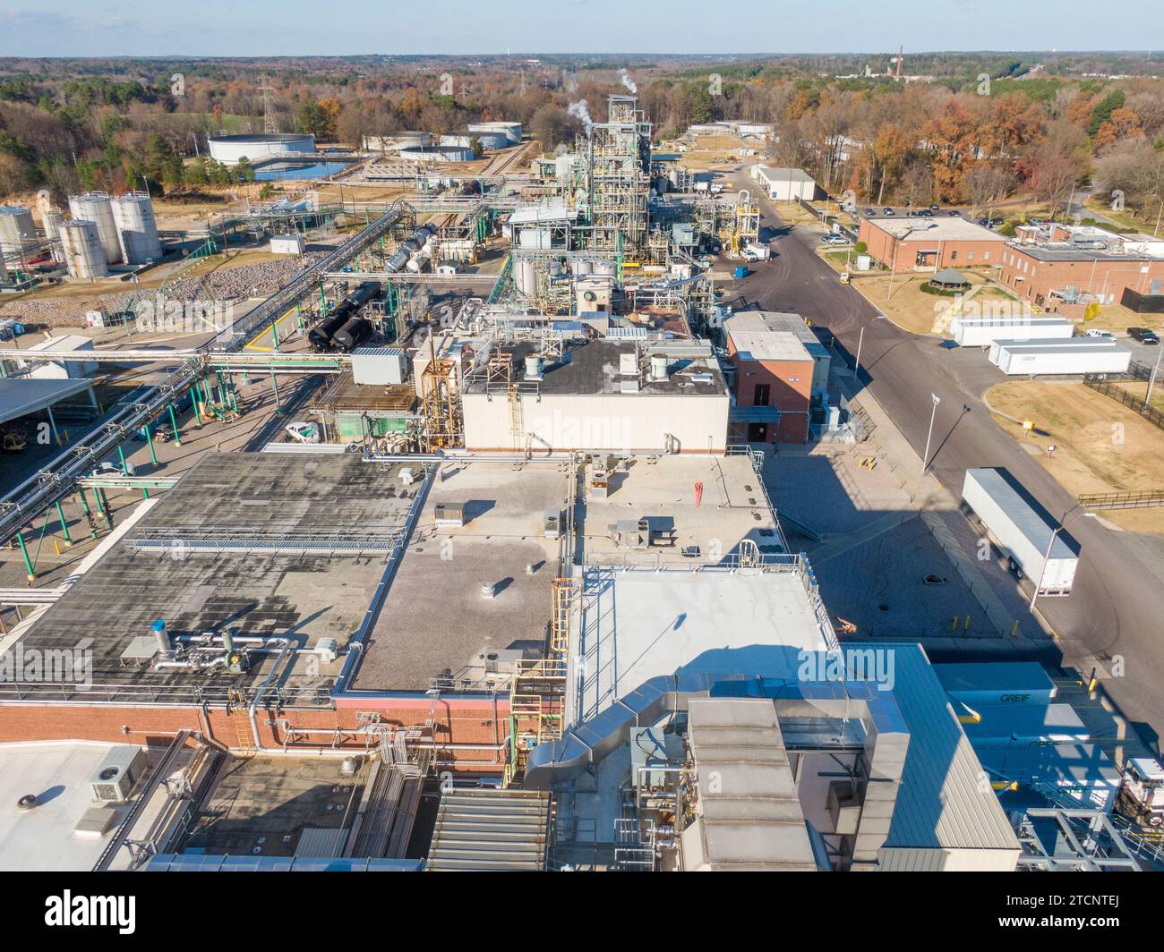 drone images of a large pharmaceutical manufacturing factory with lots ...