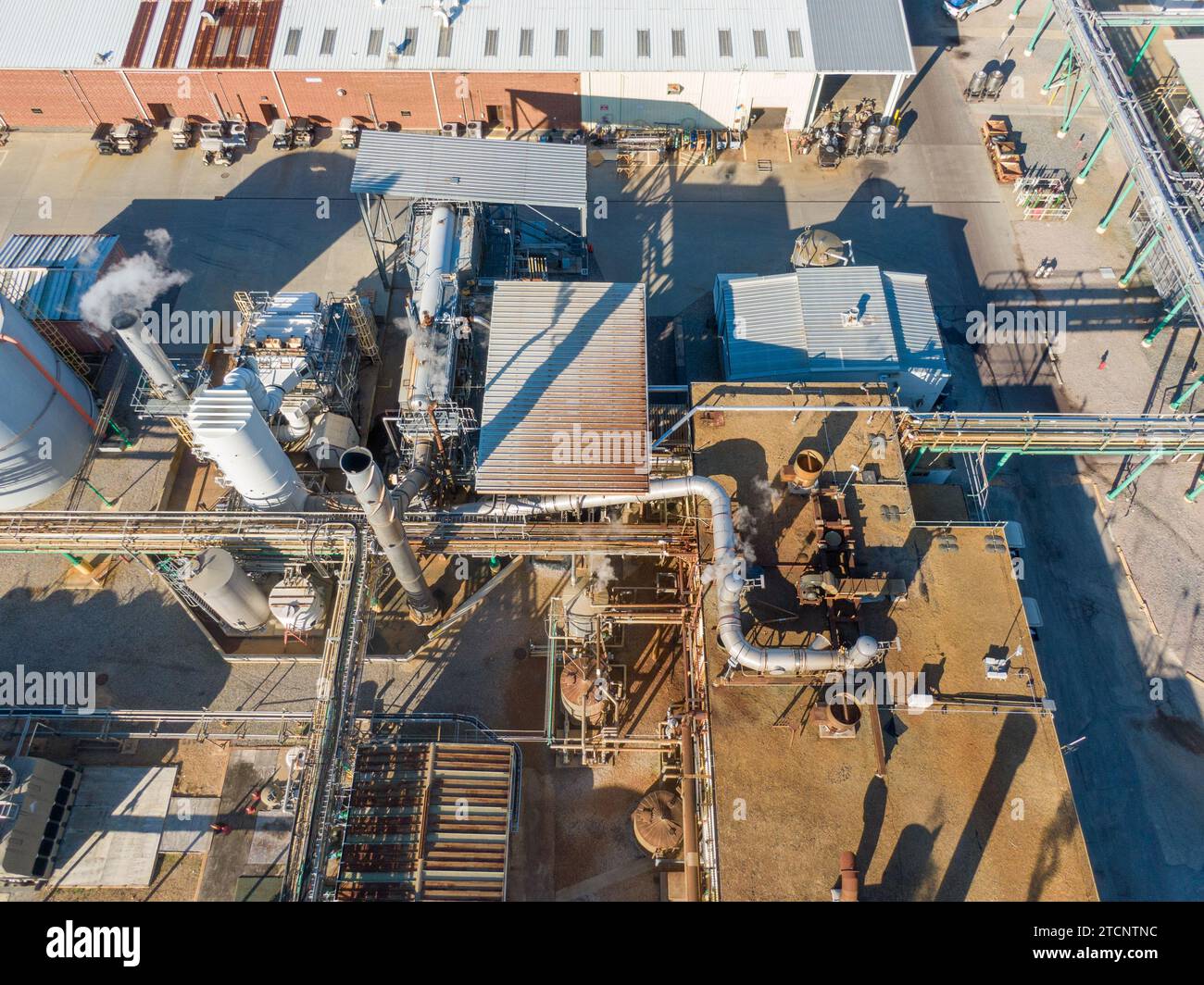 drone images of a large pharmaceutical manufacturing factory with lots ...