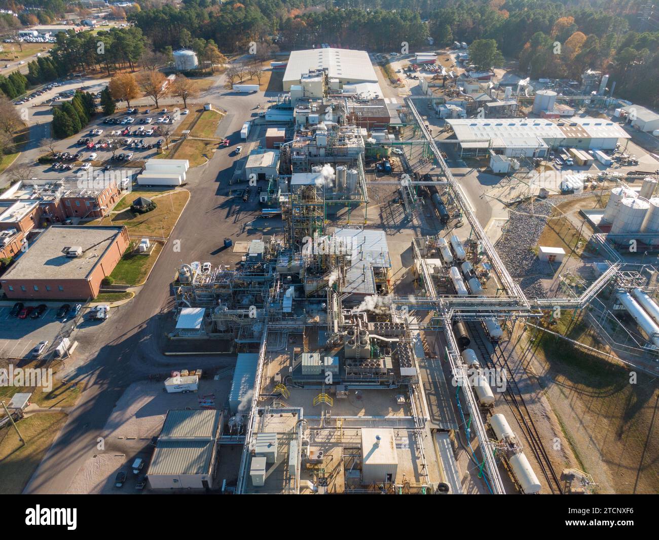 drone images of a large pharmaceutical manufacturing factory with lots ...