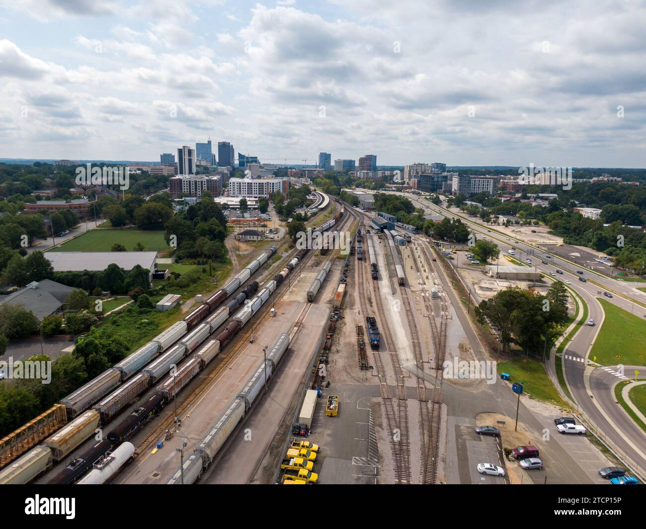 drone photos of various rail cars and amtrak trains on a cloudy day in ...