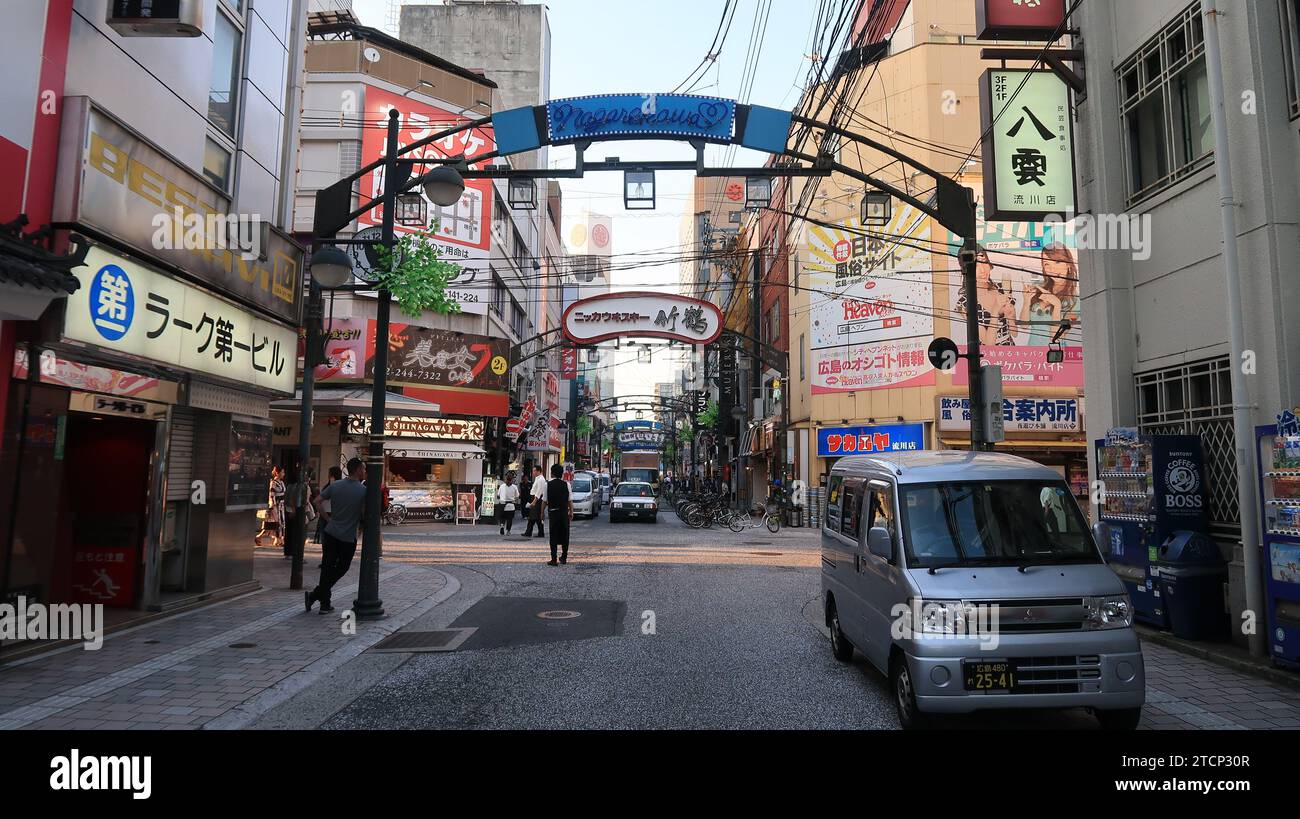 various images from a trip to Tokyo and hiroshima featuring food ...