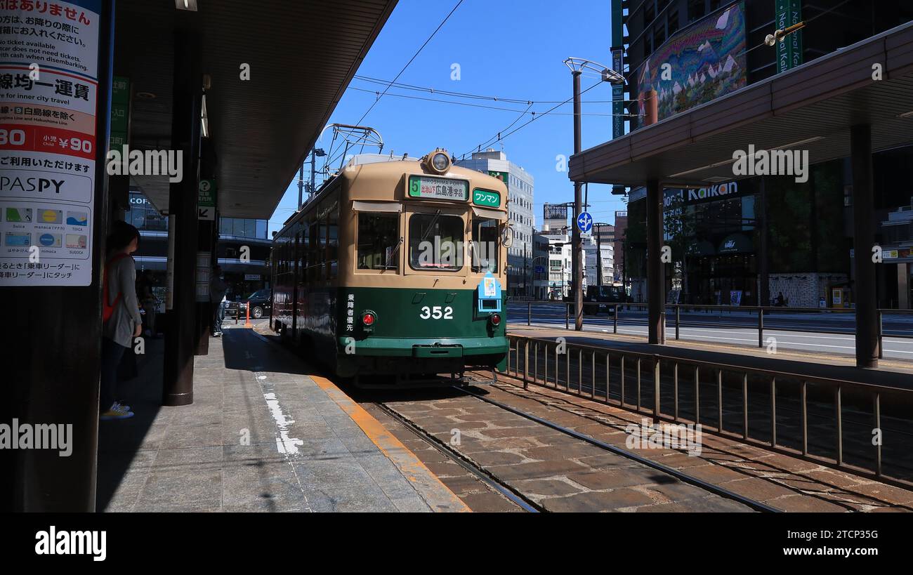 various images from a trip to Tokyo and hiroshima featuring food ...