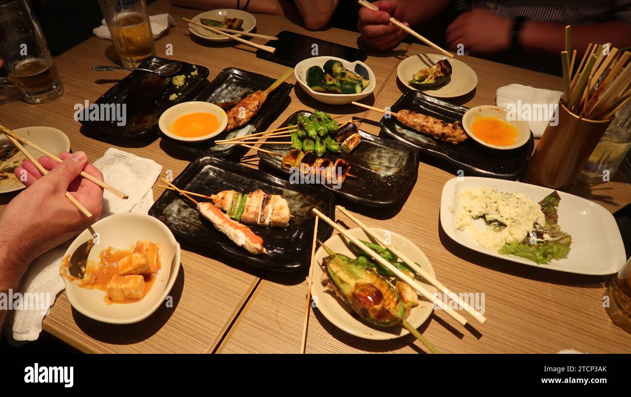 various images from a trip to Tokyo and hiroshima featuring food ...