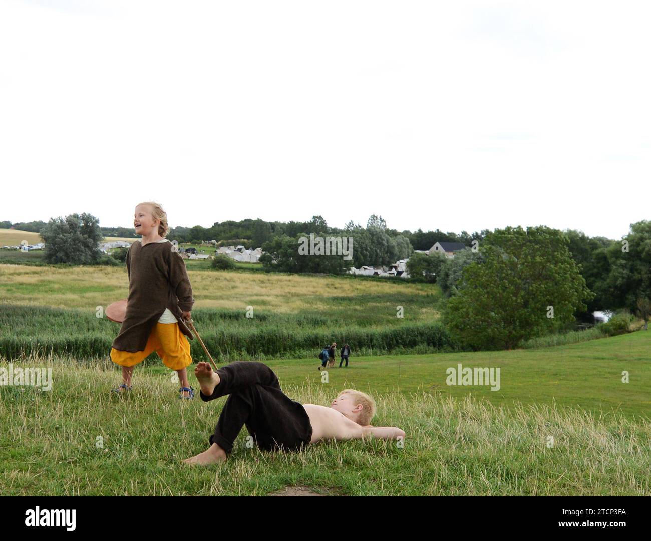 Danish children playing at the ancient Viking ring castle, at the ...